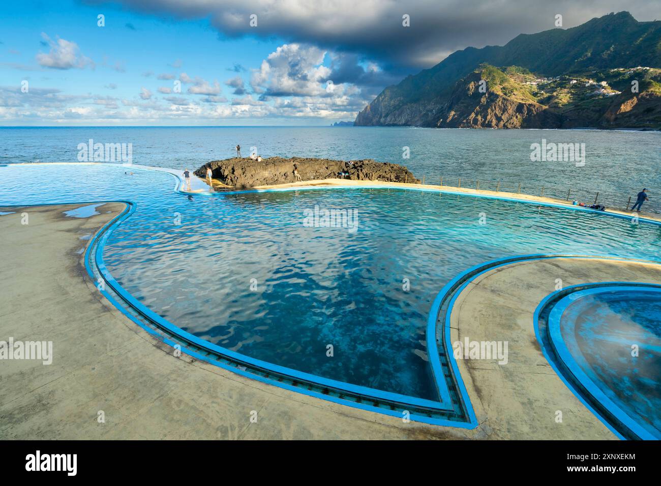 Coastal swimming pools near mountains at Porto da Cruz, Machico ...