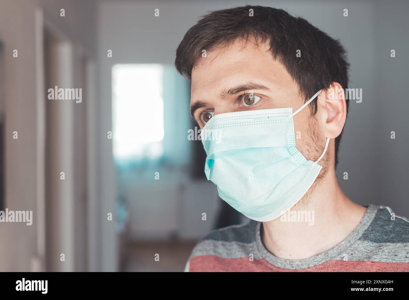 Young man medical face mask hi-res stock photography and images - Alamy