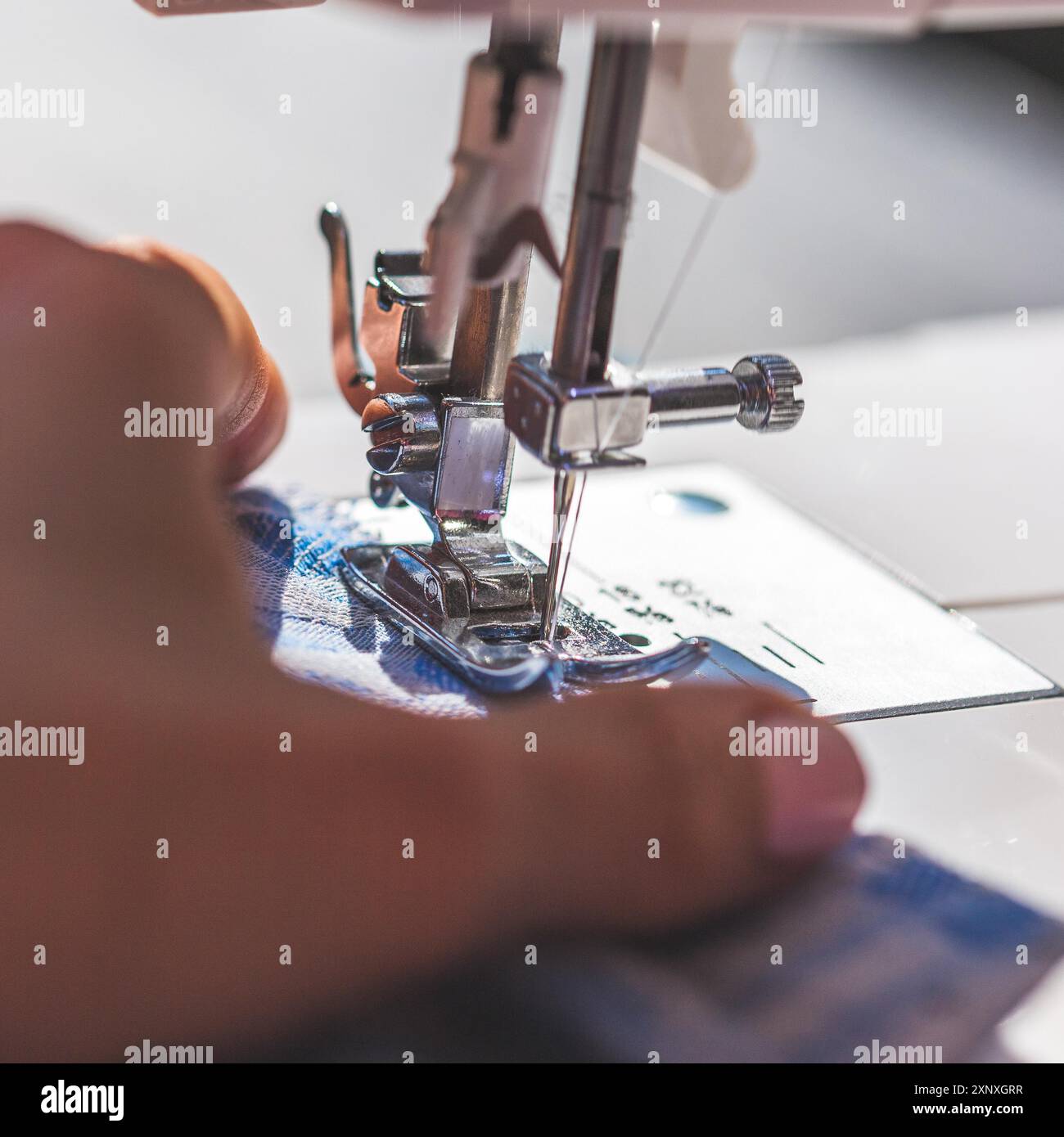 Close up of sewer working with textile and sewing needle Stock Photo ...