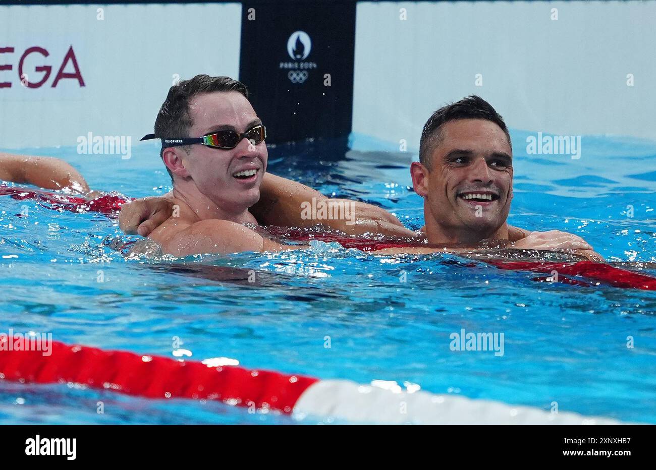 Great Britain’s Ben Proud (left) celebrates winning silver after the ...