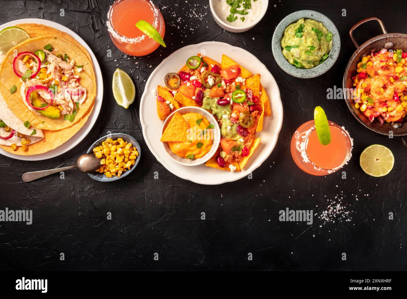 Mexican food, a flat lay on a dark background with a place for text ...