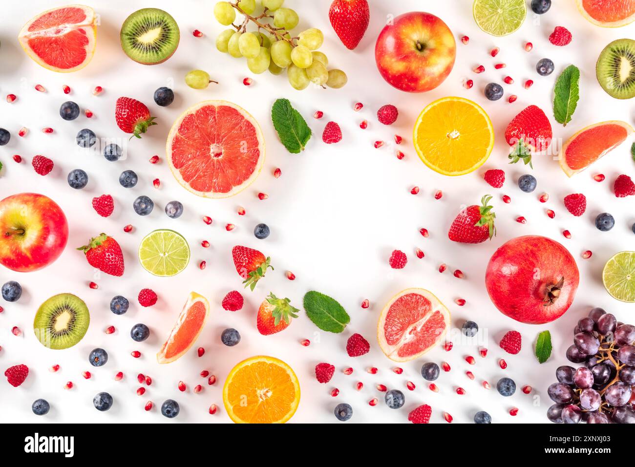 Fresh summer fruit design, a flat lay on a white background with a ...