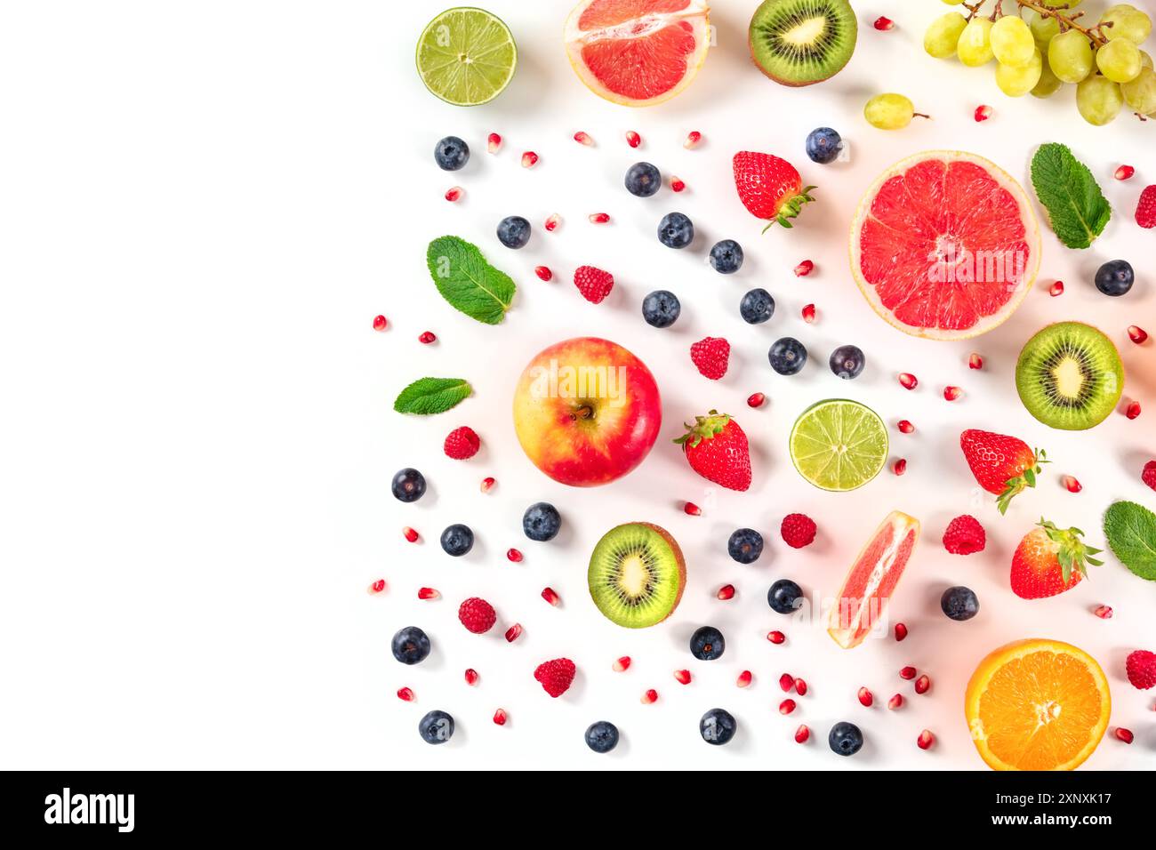 Fresh summer fruit design, a flat lay on a white background with a ...