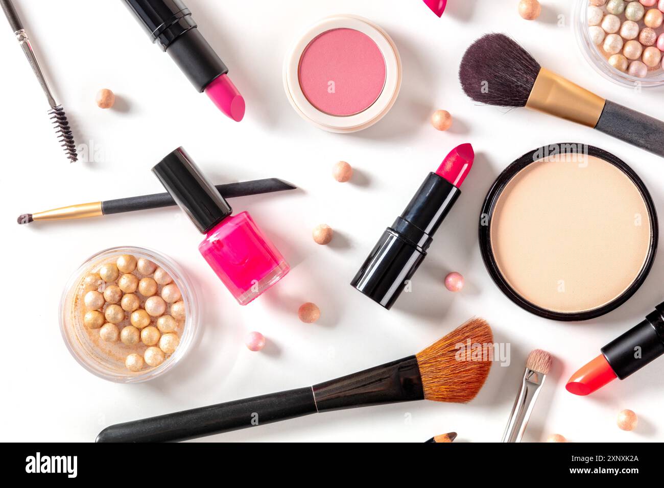 Make-up products, shot from the top on a white background. Various ...