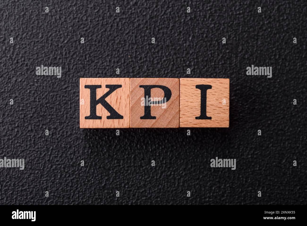 Inscription KPI Key Performance Indicator with wooden cubes, conceptual ...