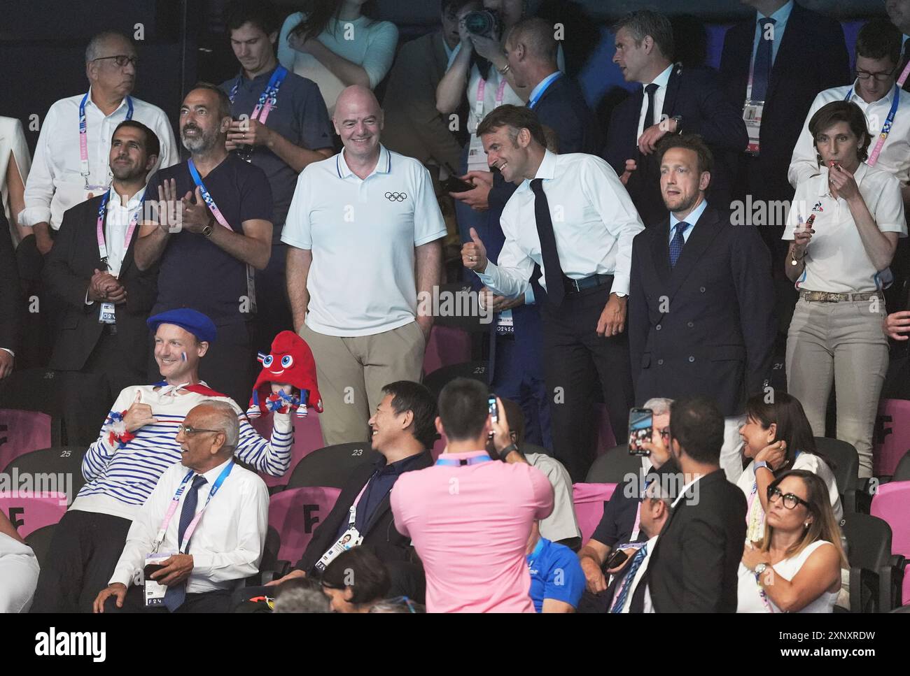 France's President Emmanuel Macron visits a venue of the swimming in ...