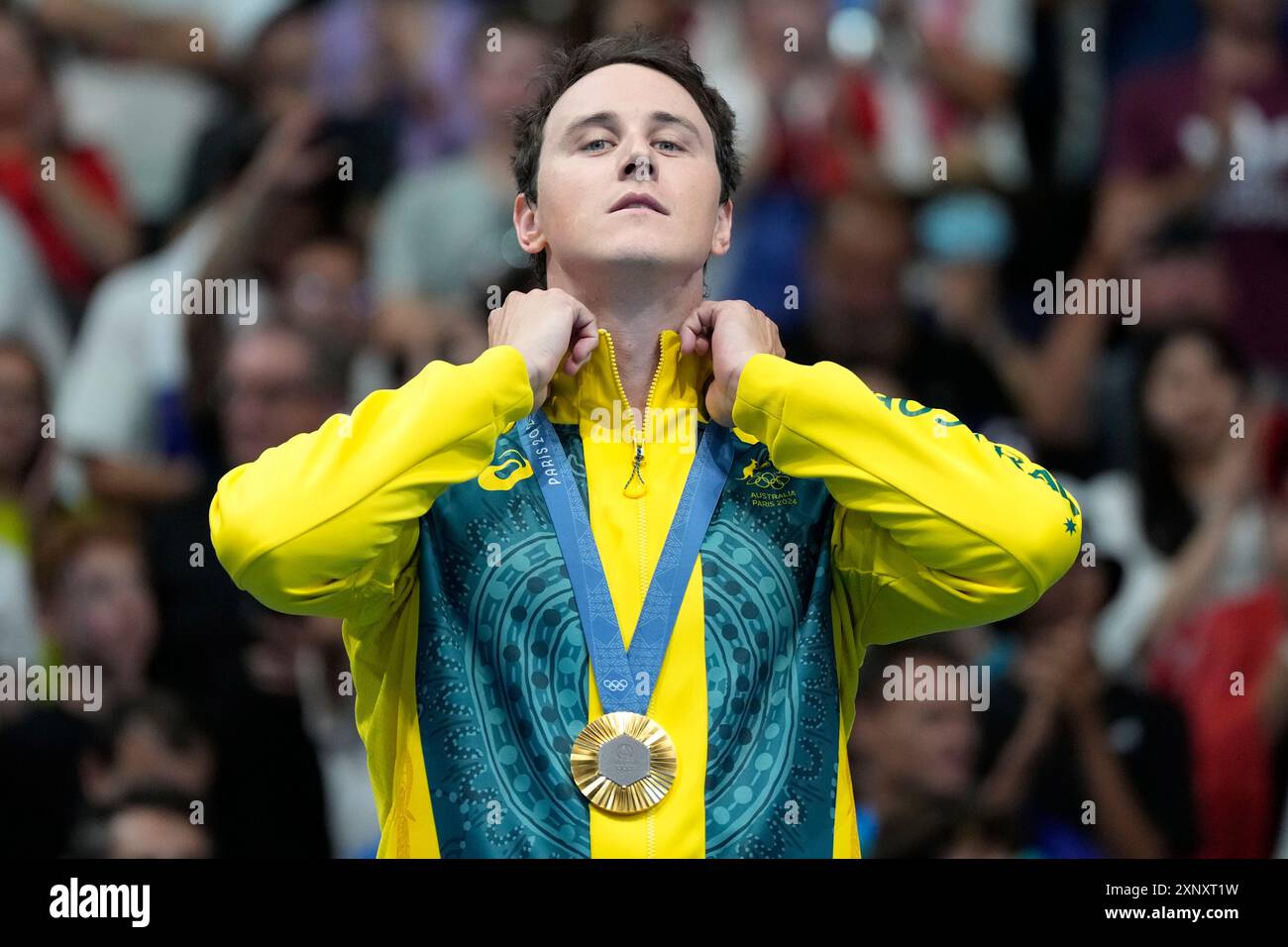 Cameron McEvoy of Australia, reacts with his gold medal for the men's ...