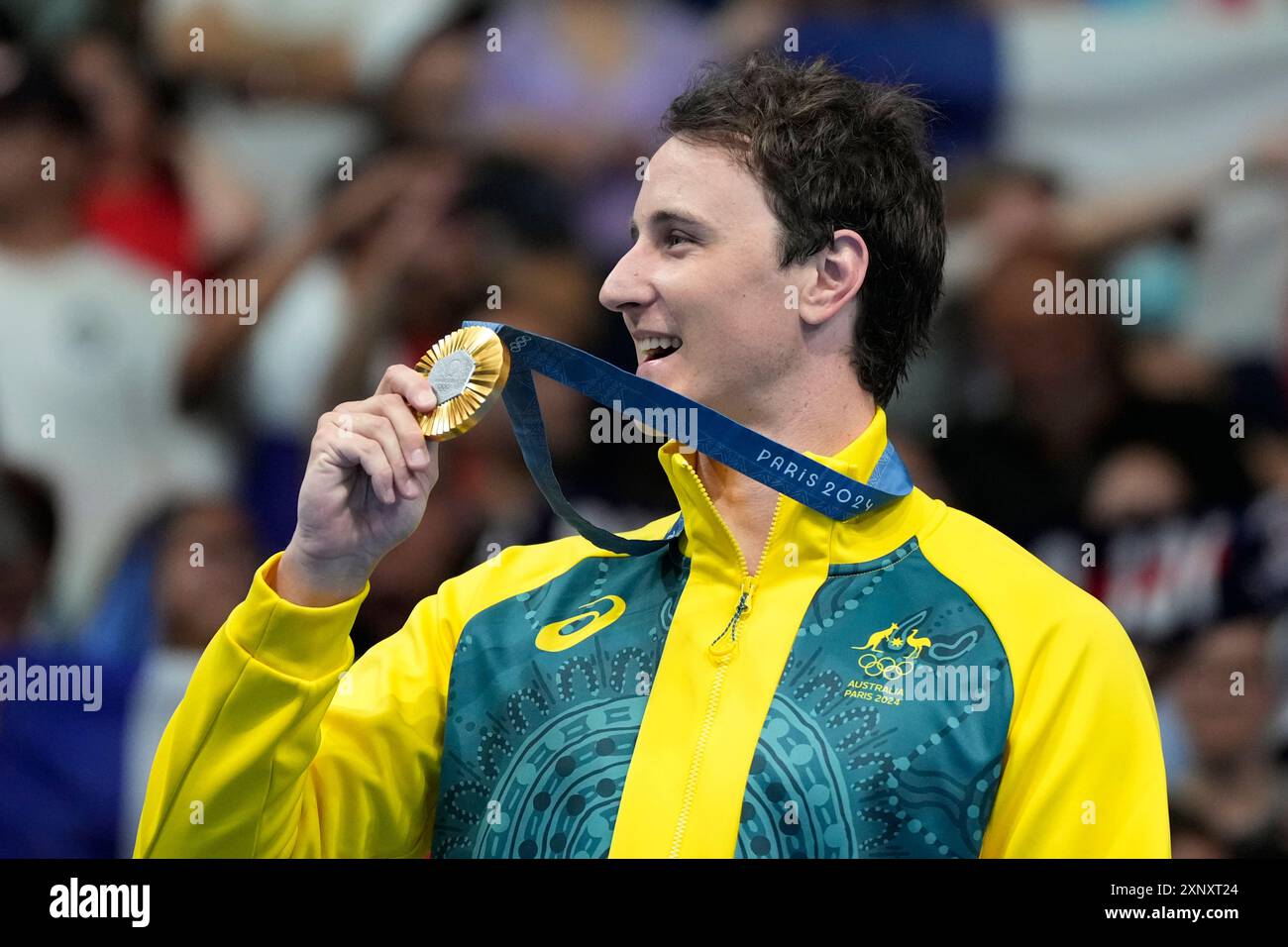 Cameron McEvoy of Australia, reacts with his gold medal for the men's ...