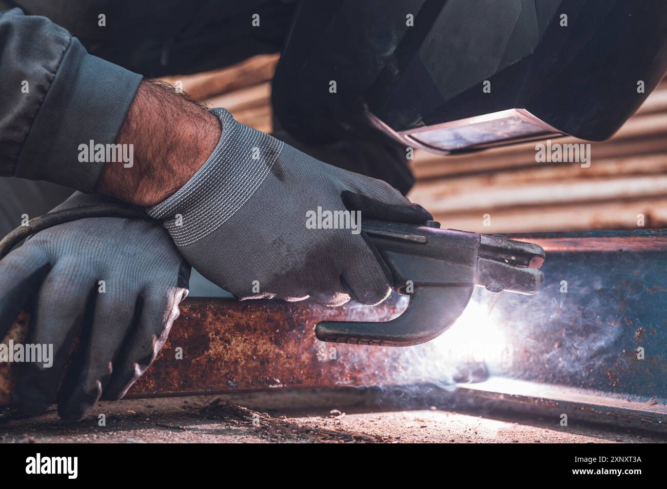 Welding work, Man Welding in Workshop. Metalwork and Sparks ...