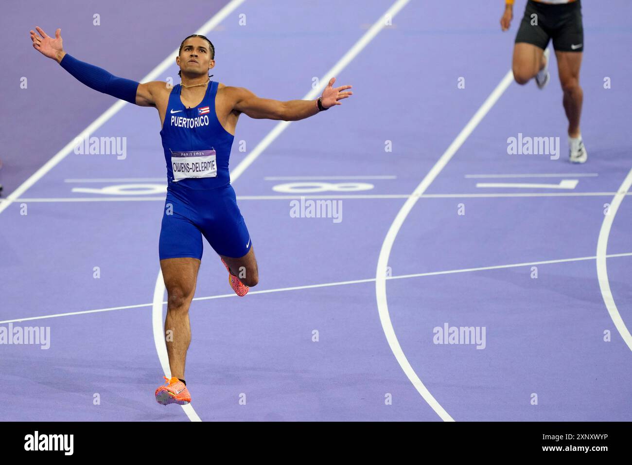 Ayden Owens-Delerme, of Puerto Rico, wins a heat in the decathlon 400 ...
