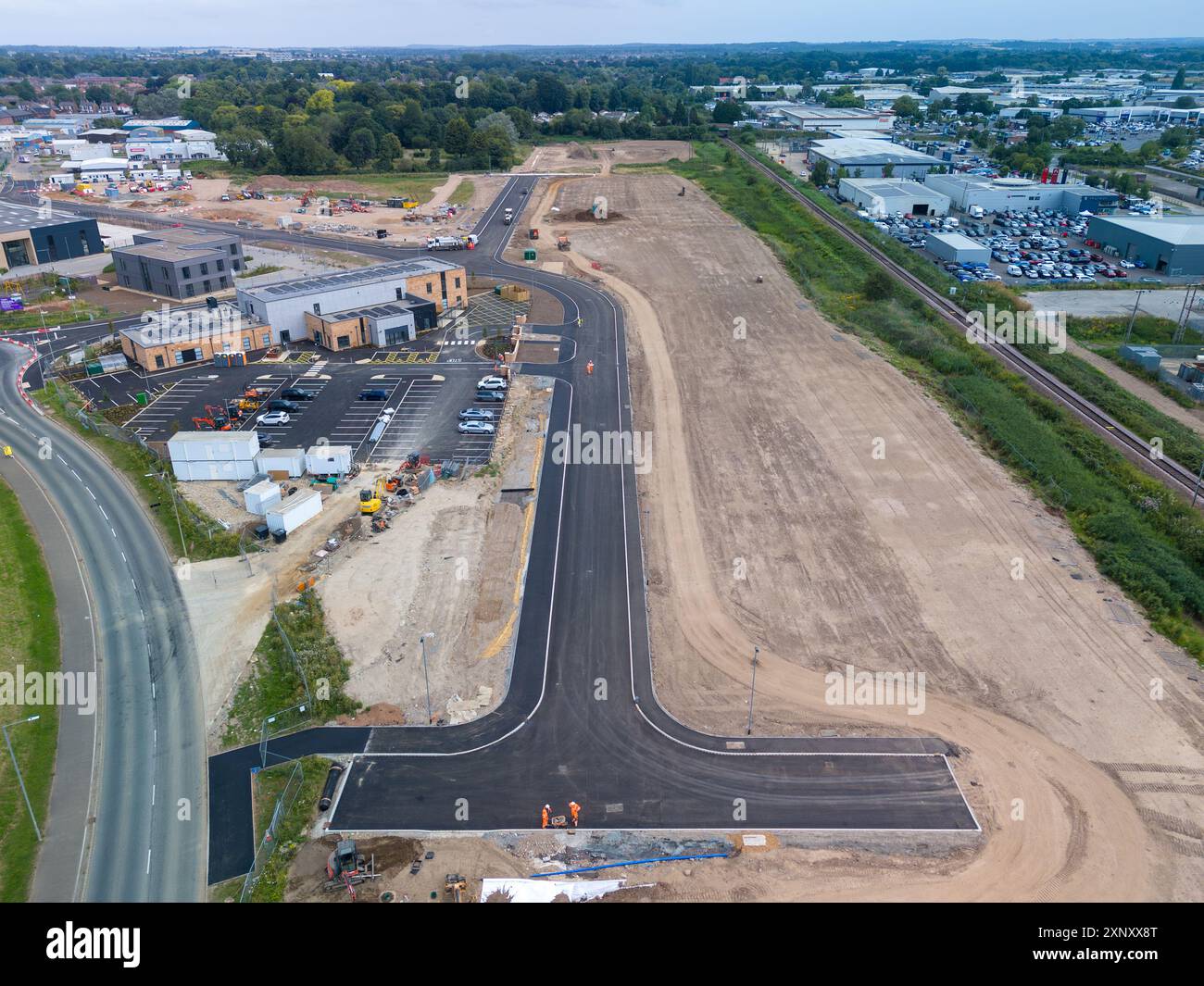 Aerial view of a new road being built in an industrial estate ...