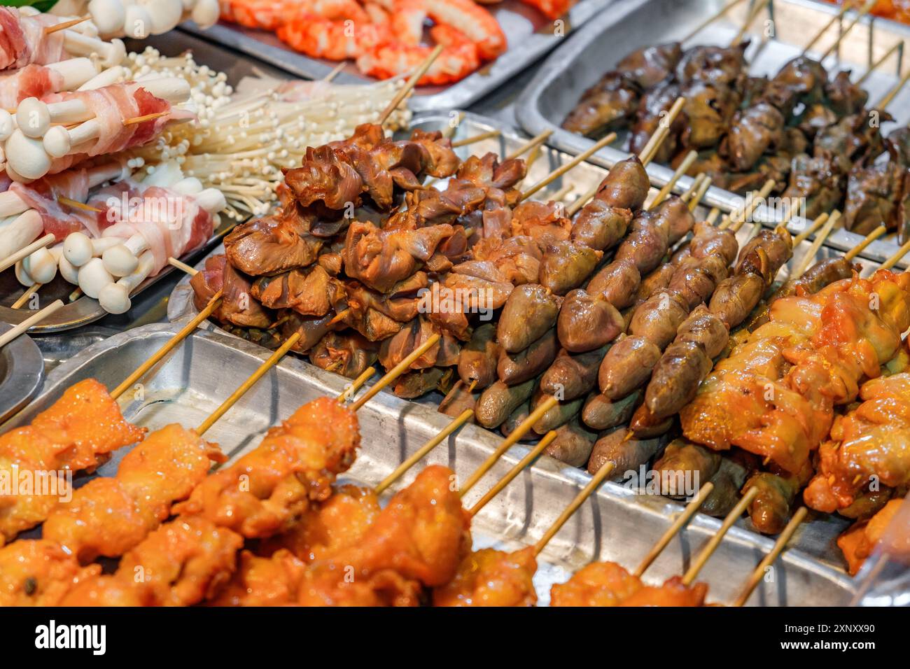 grilled meat products on street food market Stock Photo - Alamy
