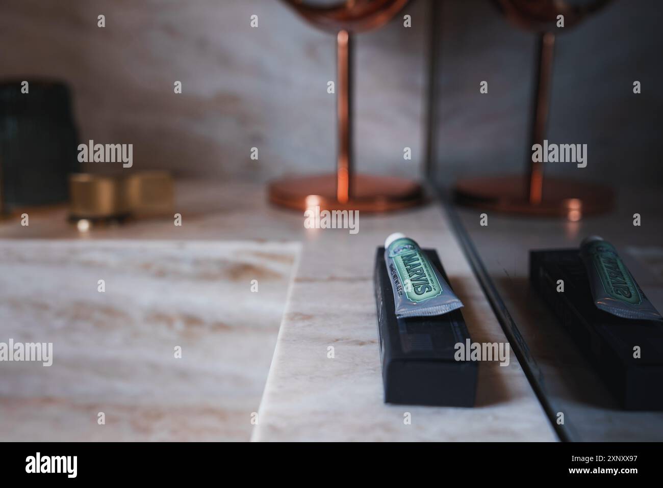 Luxurious Marble Bathroom Countertop with Copper Fixtures in a High-End ...