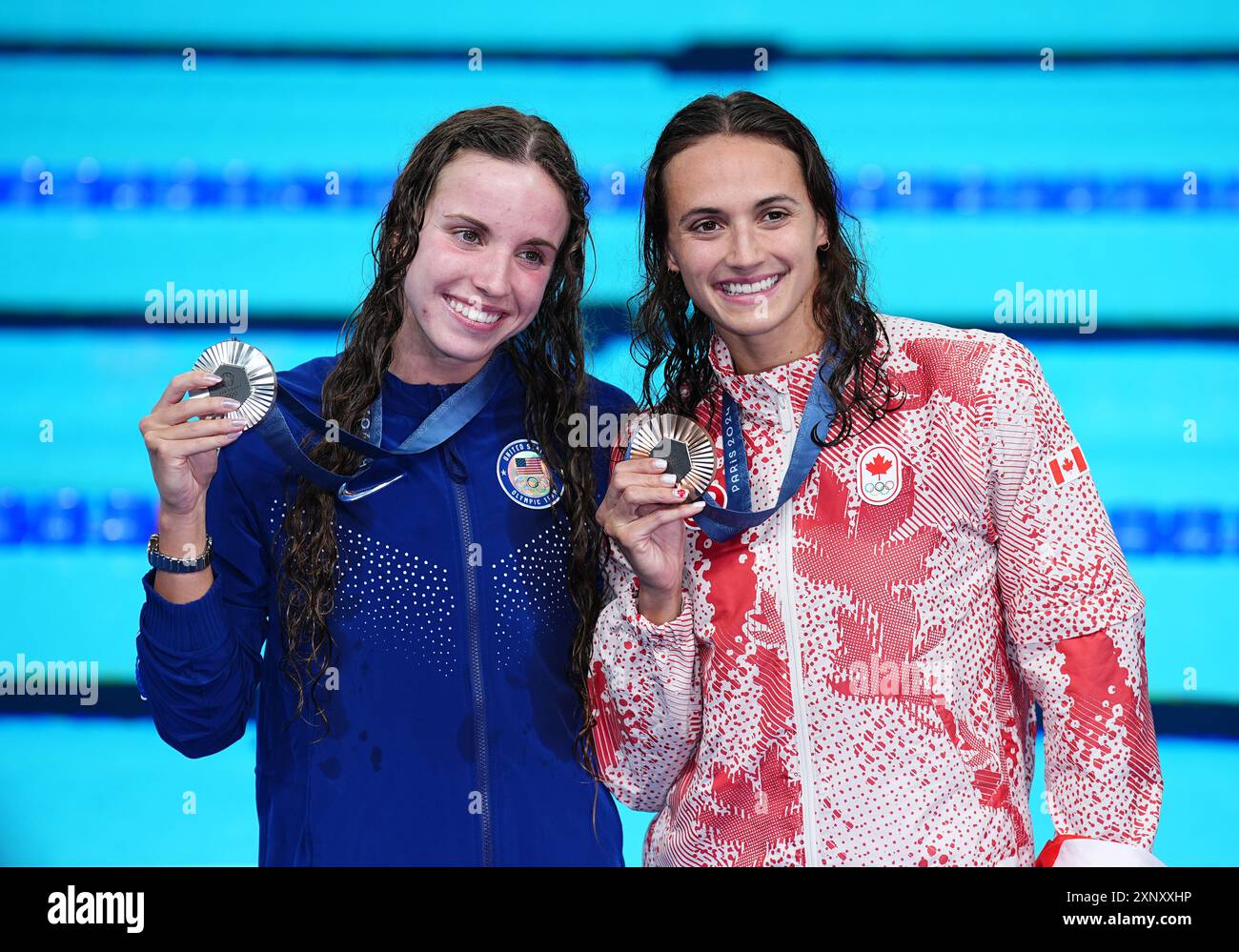 USA’s Regan Smith (left) and Canada’s Kylie Masse on the podium after ...