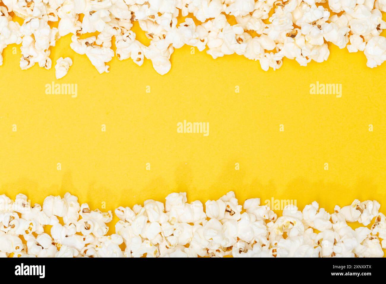 Popcorn on yellow background. Movie or TV background, border, frame ...