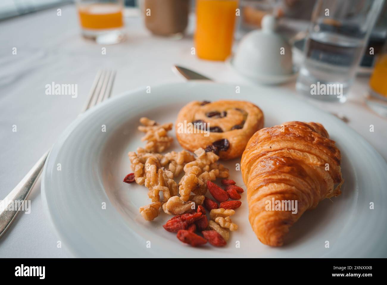 Elegant Breakfast Plate with Croissant and Pastry in Luxury Hotel ...