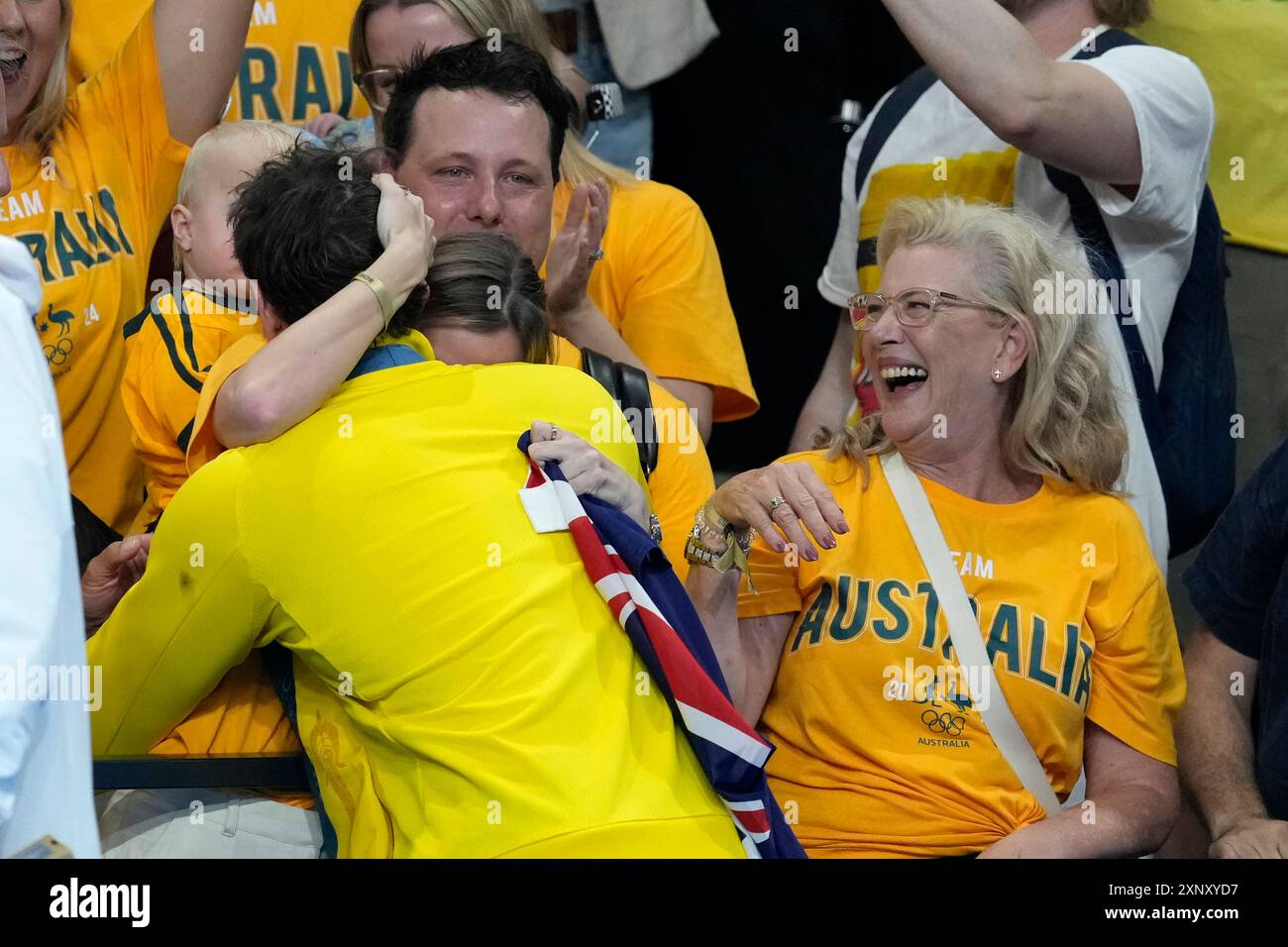 Cameron McEvoy of Australia, is embraced by family after winning the ...