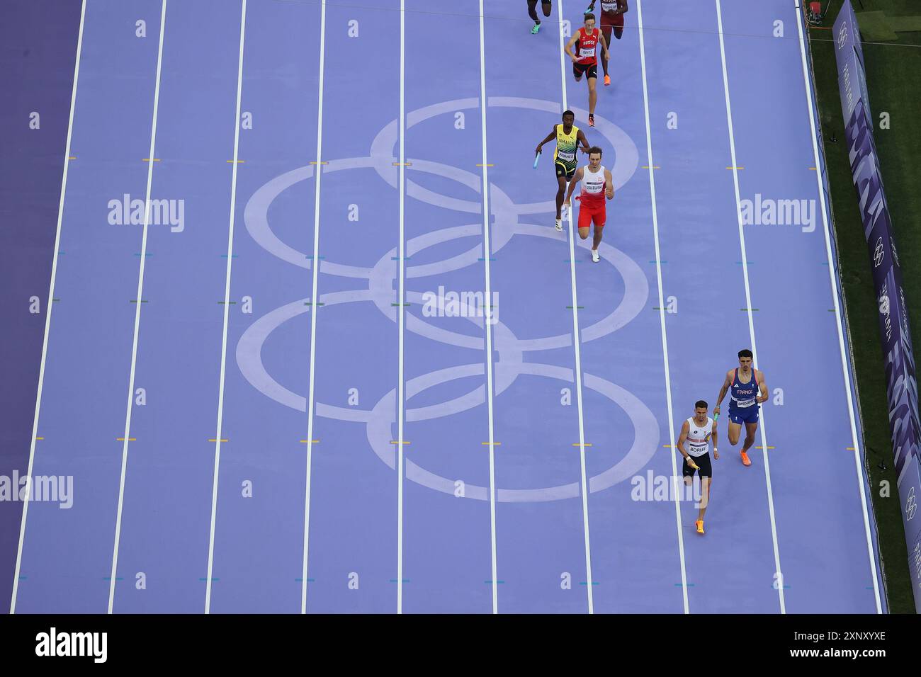 Paris, France. 2nd Aug, 2024. Athletes compete during the 4x400m relay ...