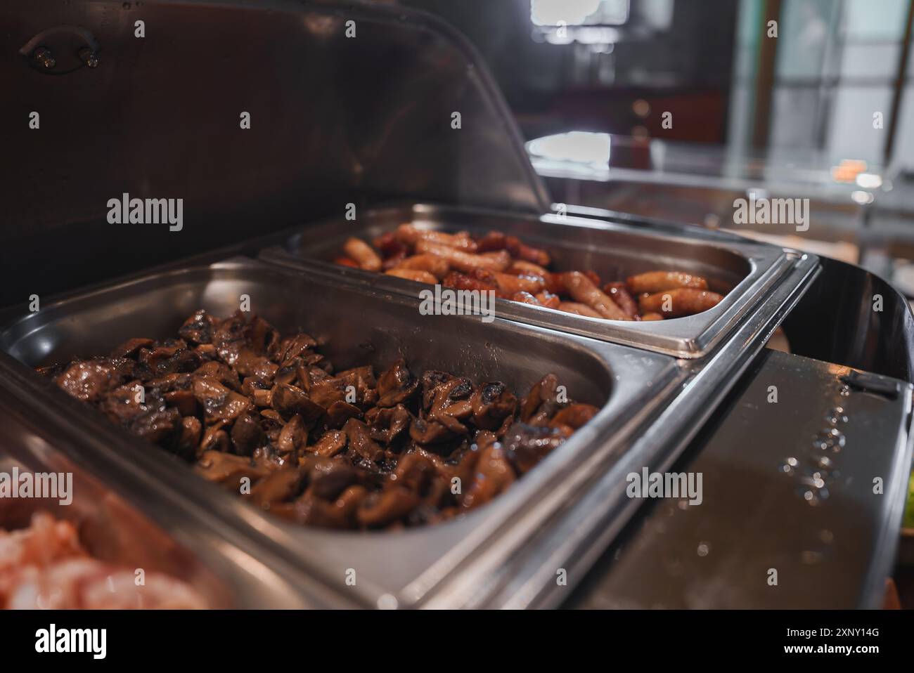 Elegant Buffet Setup with Stainless Steel Chafing Dishes in Luxury ...