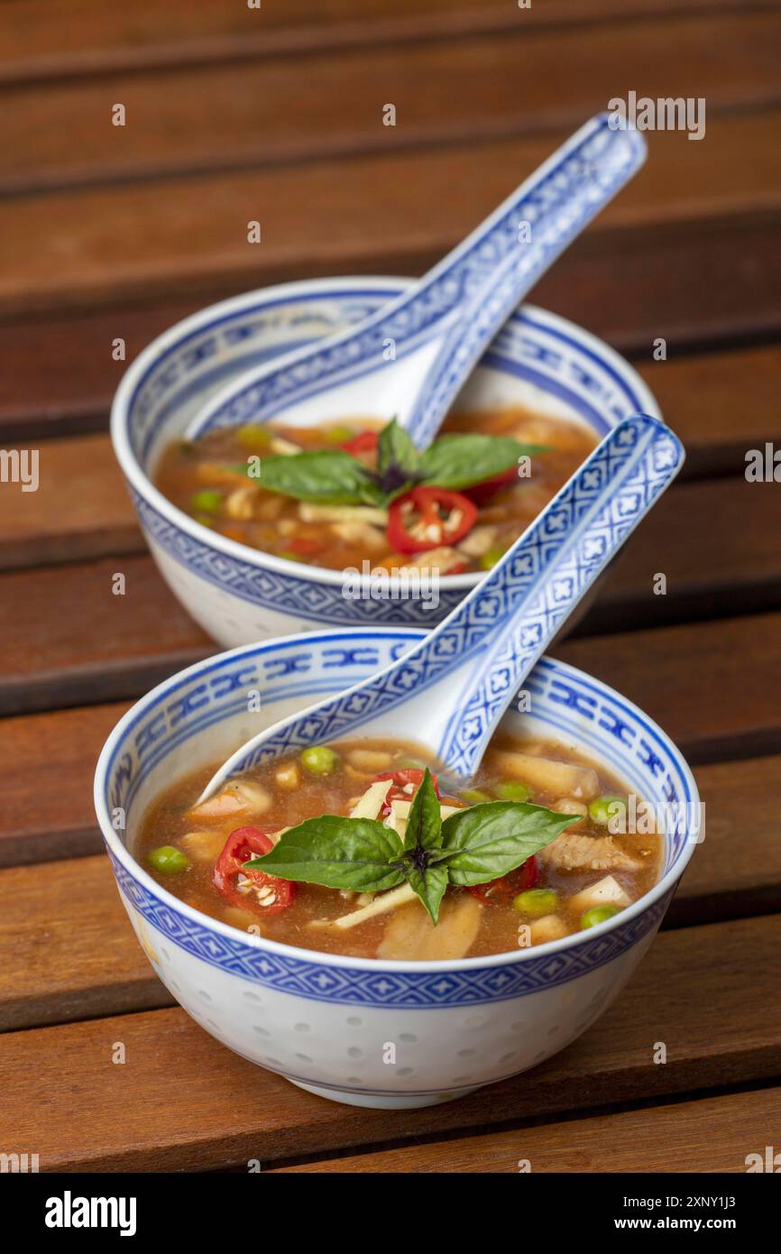 Chinese sweet and sour soup on wood Stock Photo - Alamy