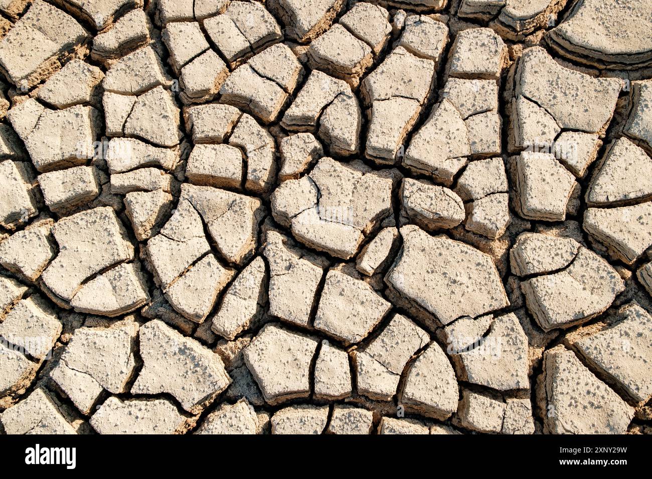 cracked dry earth, top view, close-up Stock Photo - Alamy