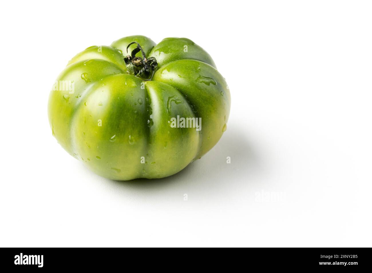 Green tomato background hi-res stock photography and images - Alamy