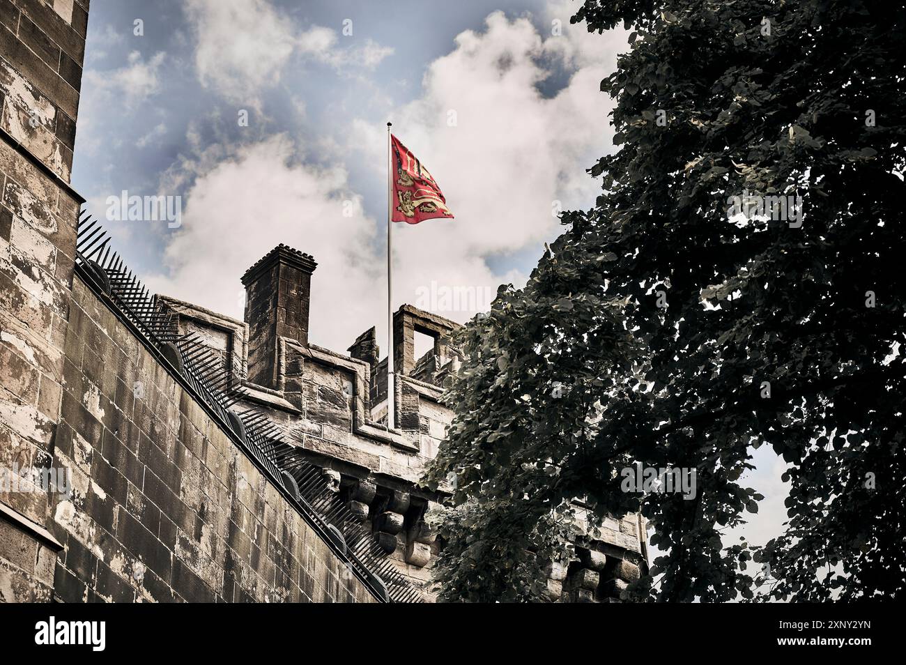 Flag flying over the battlements of Lancaster Castle Stock Photo - Alamy