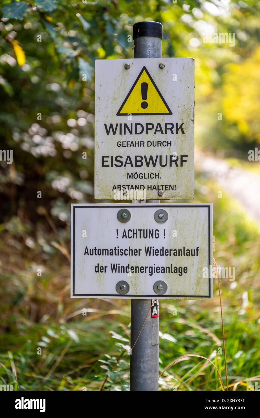 Close-up german yellow warning sign attention ice can fall down from ...