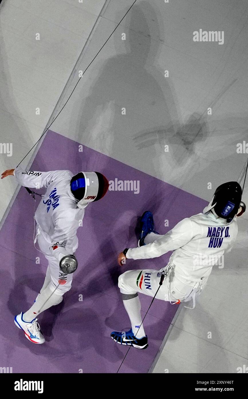 Japan's Masaru Yamada, left, and Hungary's David Nagy compete in the ...