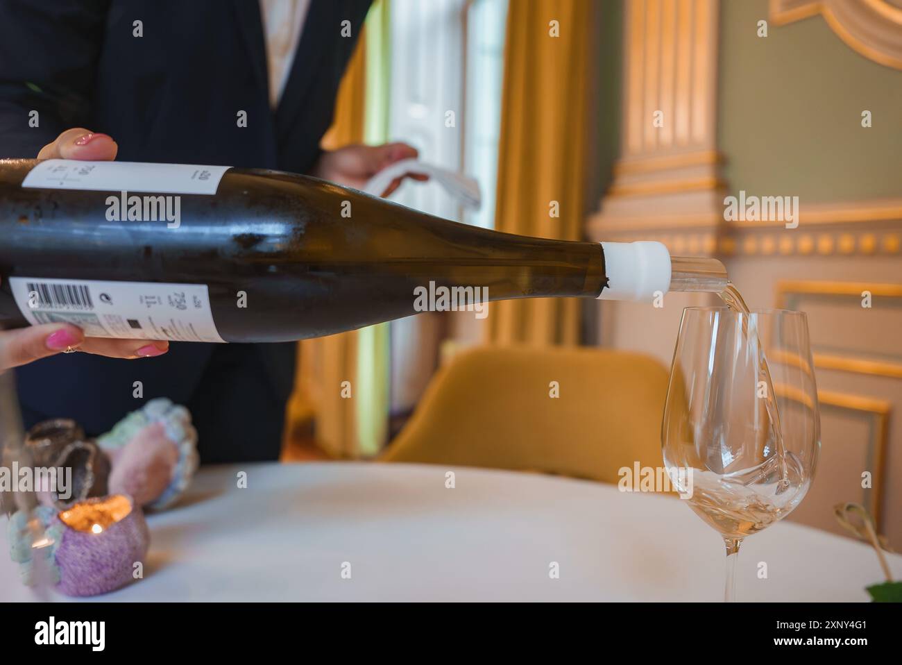 Luxurious Dining Experience with Wine Service in Elegant Hotel Setting ...