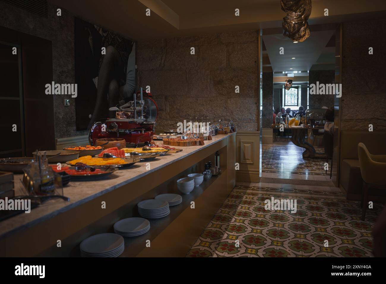 Luxurious Hotel Dining Area with Buffet Table and Modern Art Piece ...