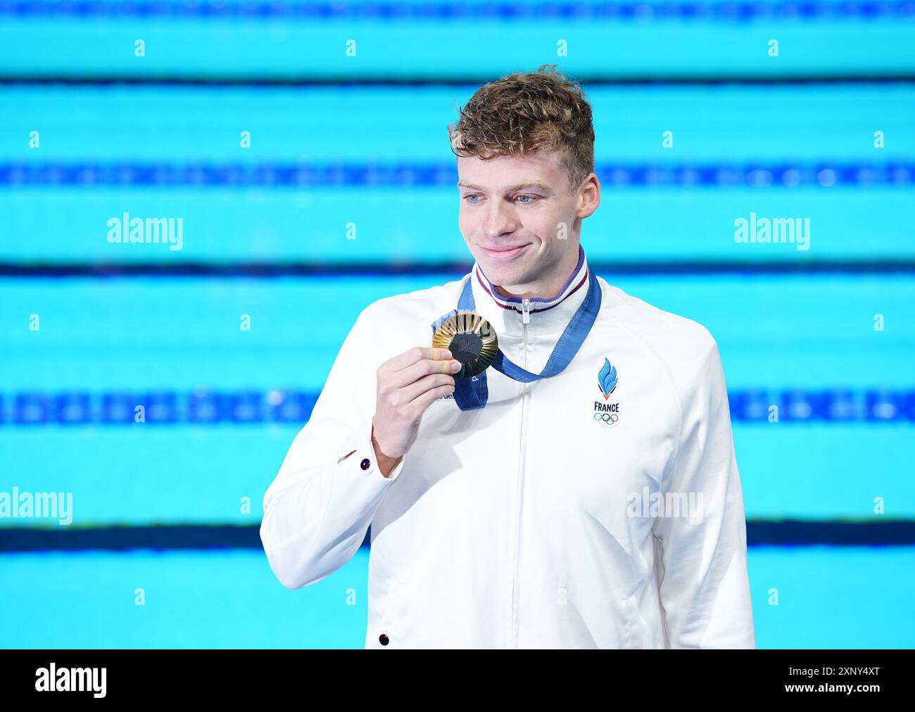 France’s Leon Marchand with his Gold medal after winning in the Men’s ...