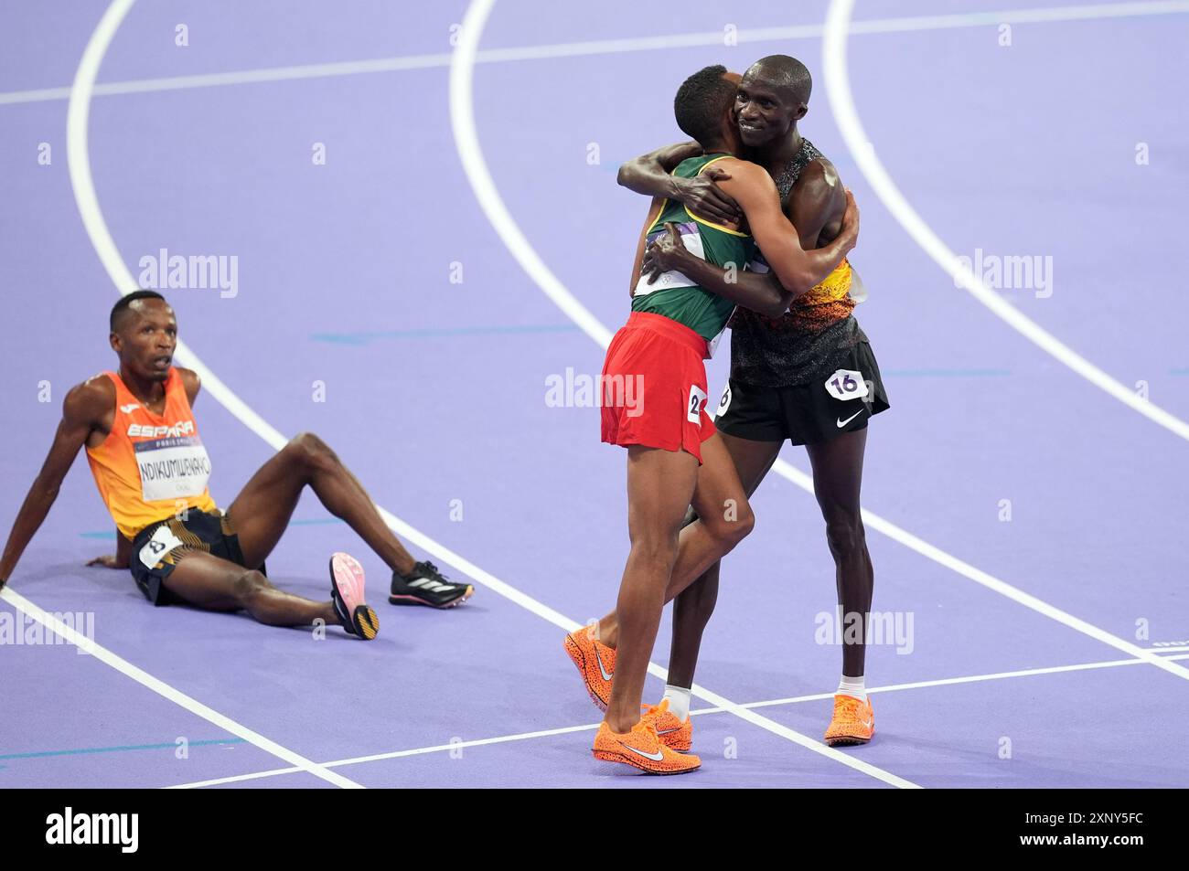Uganda's Joshua Cheptegei with Ethiopia's Berihu Aregawi after winning ...