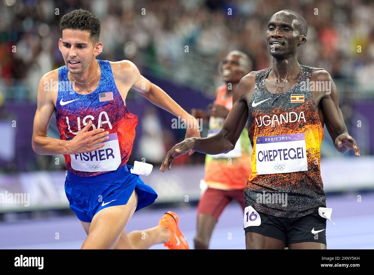 Bronze medalist Grant Fisher, left, of the United States, and gold ...