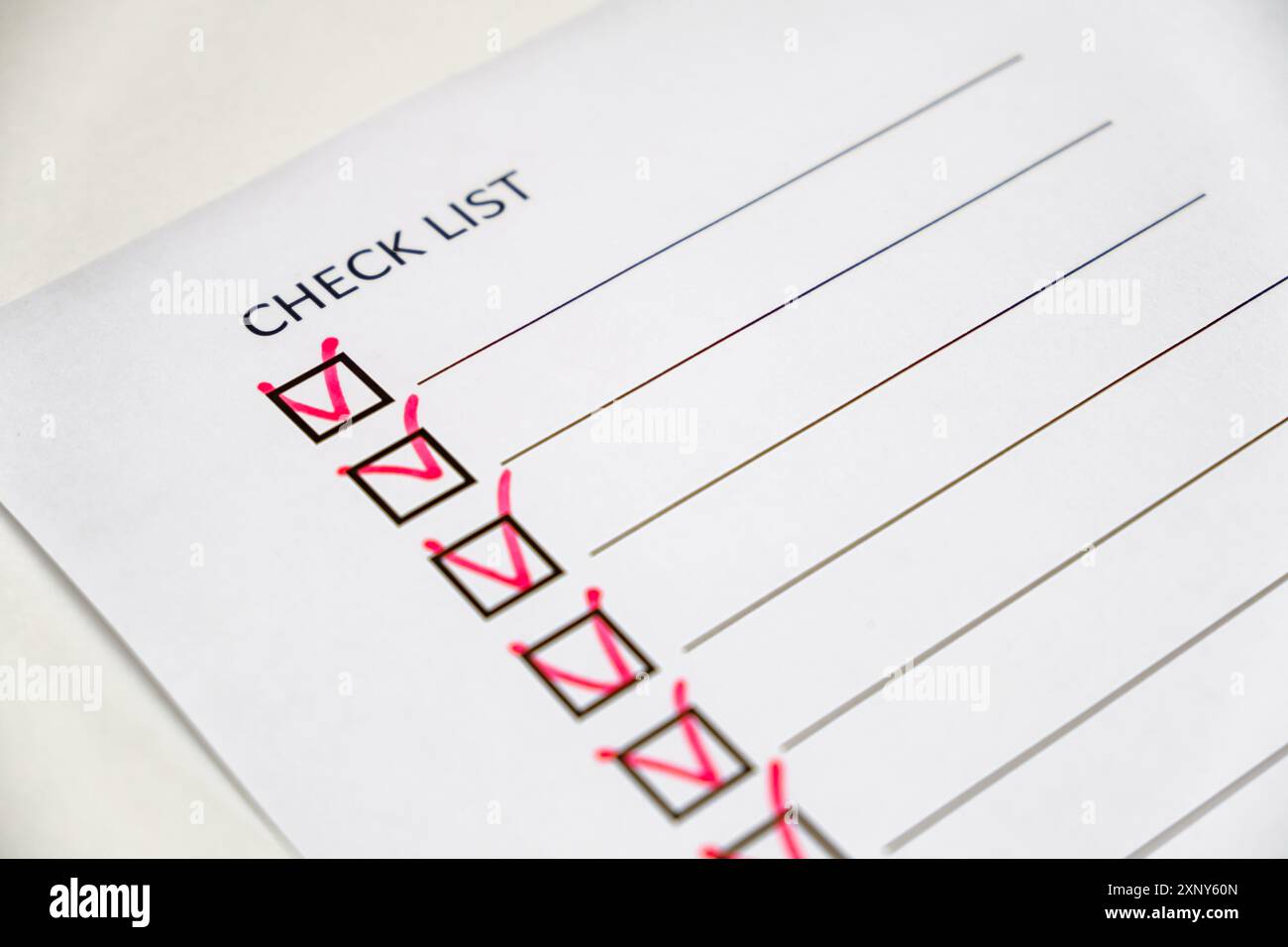 checklist with red check marks on paper Stock Photo - Alamy