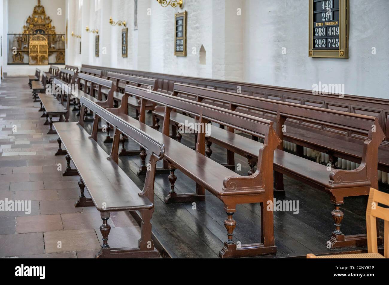 Empty church wooden benches hi-res stock photography and images - Alamy