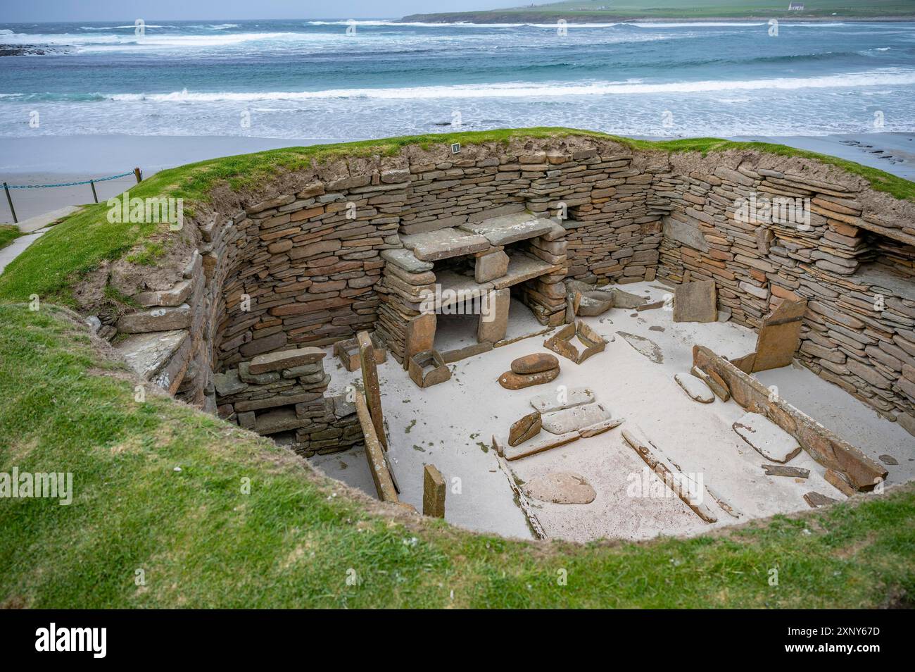 Skara Brae prehistoric village at Orkney Island, wide angle shot, sea ...