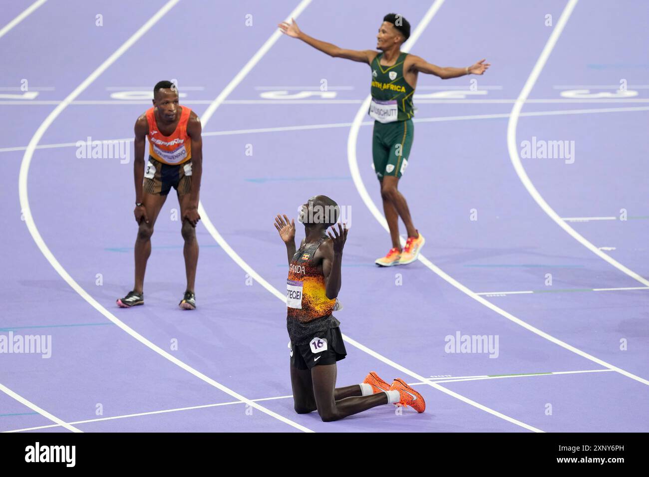 Joshua Cheptegei, of Uganda, celebrates after winning the men's 10,000 ...