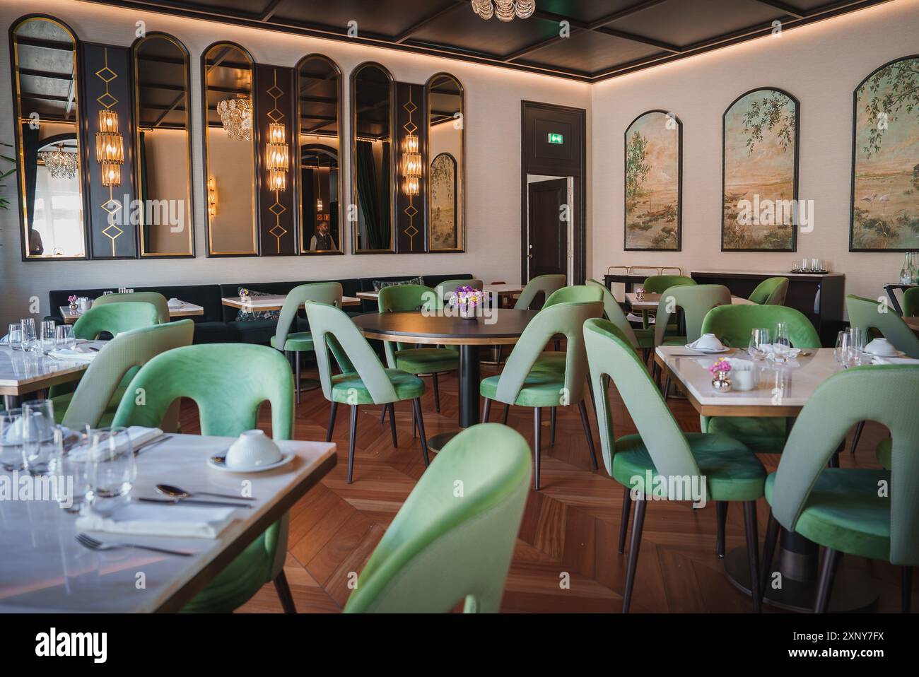 Luxurious Hotel Dining Area with Elegant Green Chairs and Fine Dining ...