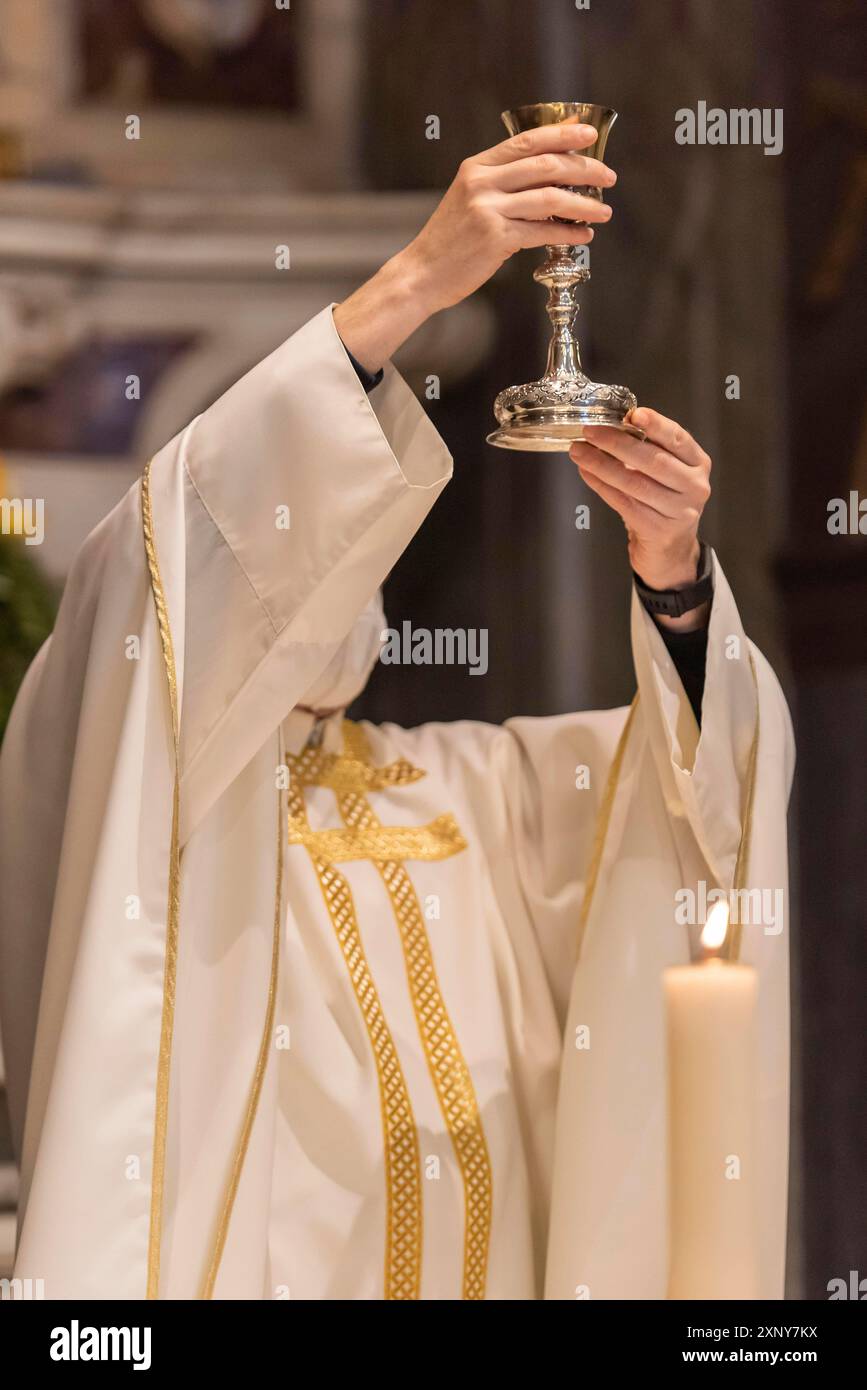 The elevation of the Goblet with the sacramental wine during the ...