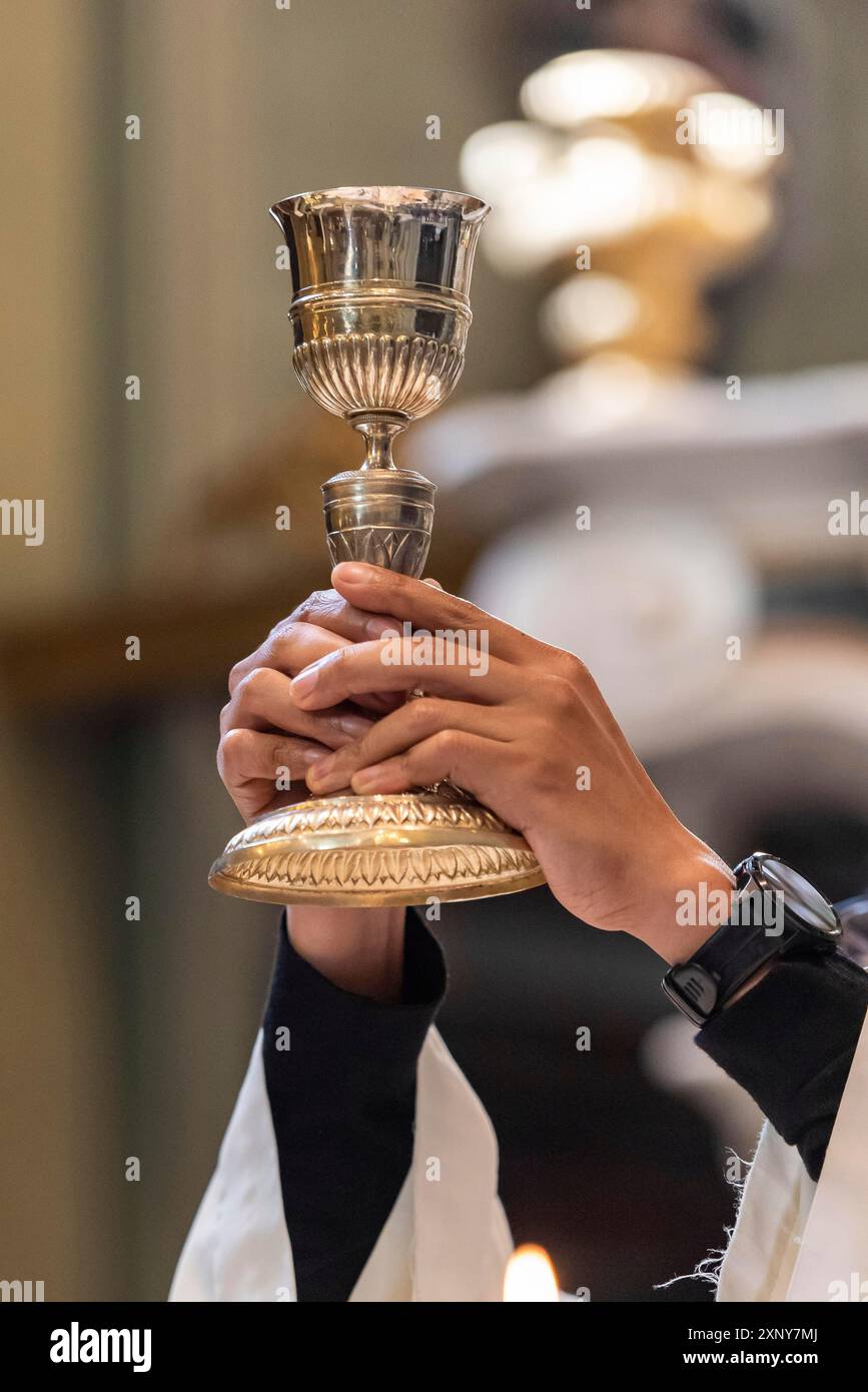 The elevation of the Goblet with the sacramental wine during the ...