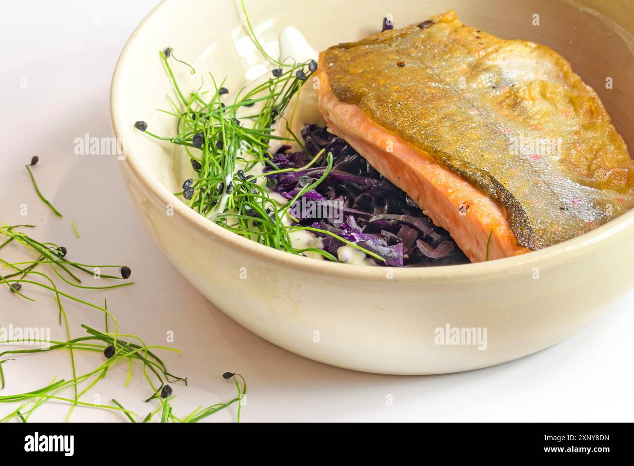 Char fish filet roasted on the skin with red cabbage kimchi, cream ...