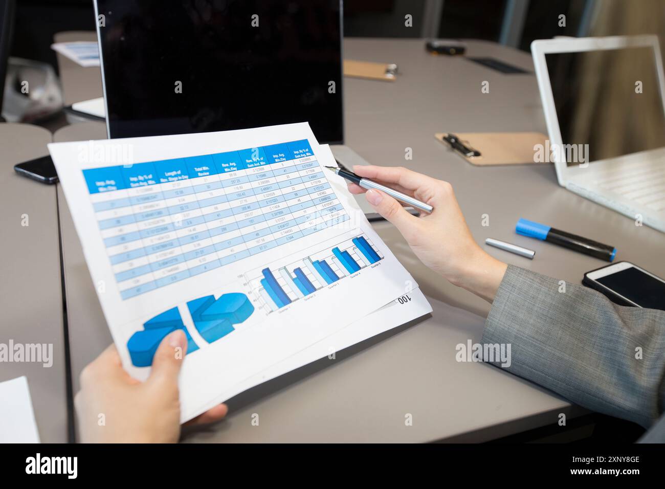 Businessman analyzing graphs hi-res stock photography and images - Alamy