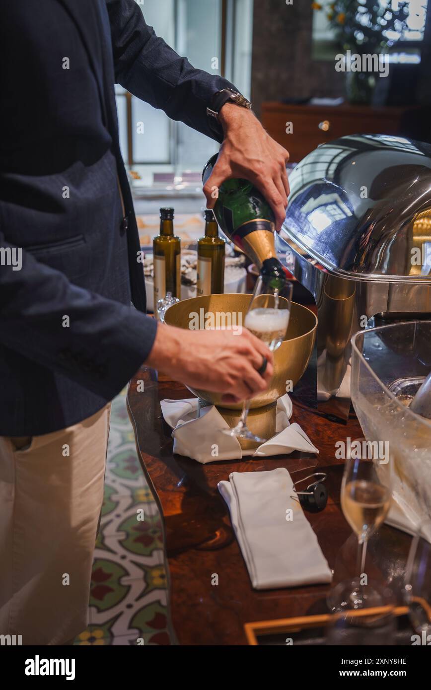 Elegant Champagne Pouring in Luxury Hotel with Upscale Decor and Buffet ...