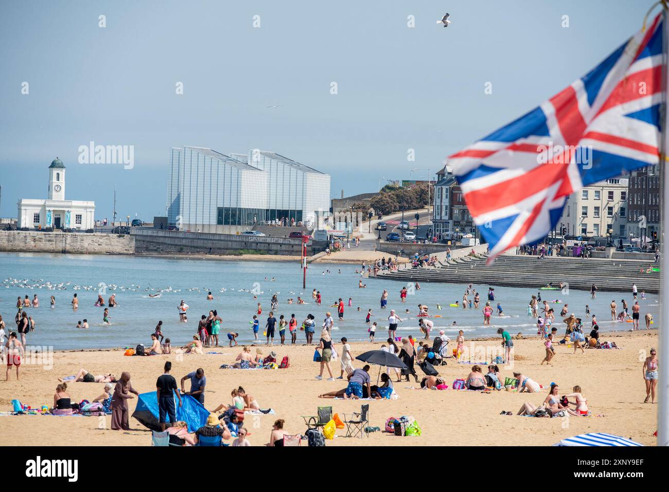People enjoy the sunshine and the water on the Margate Beach. Another ...