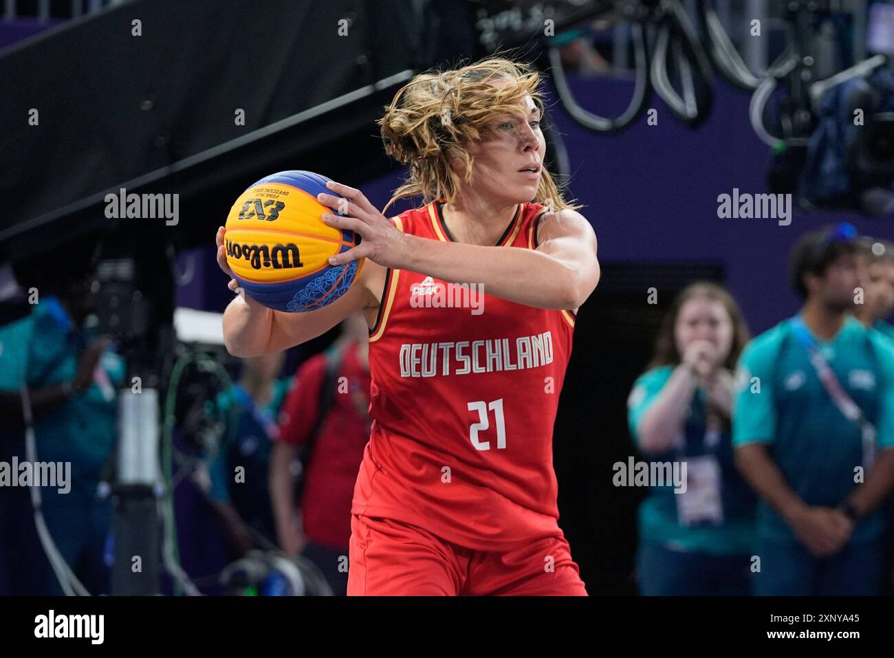 Germany's Svenja Brunckhorst (21) looks to pass in the women's 3x3 ...