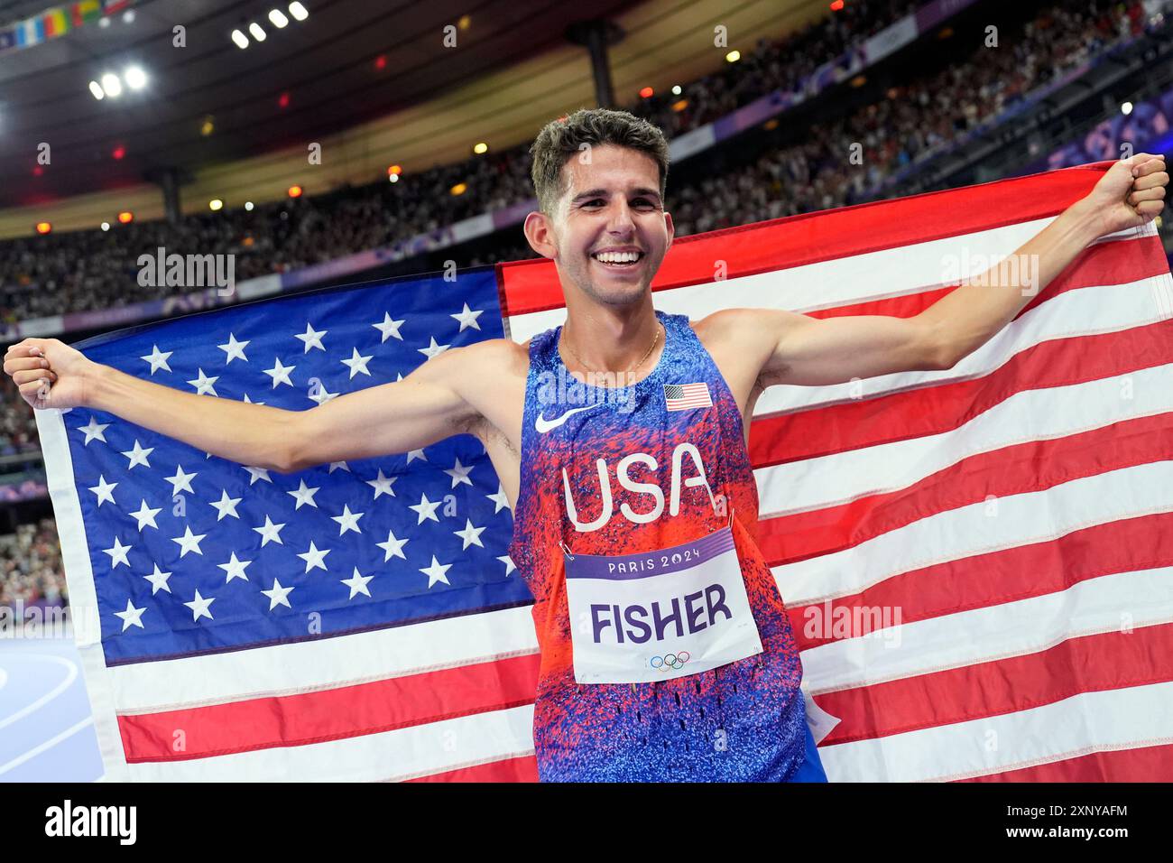 Grant Fisher, of the United States, poses after winning the bronze ...