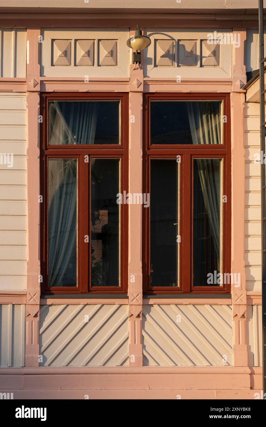 Window of a traditional, pink-painted wooden house, Naantali or ...