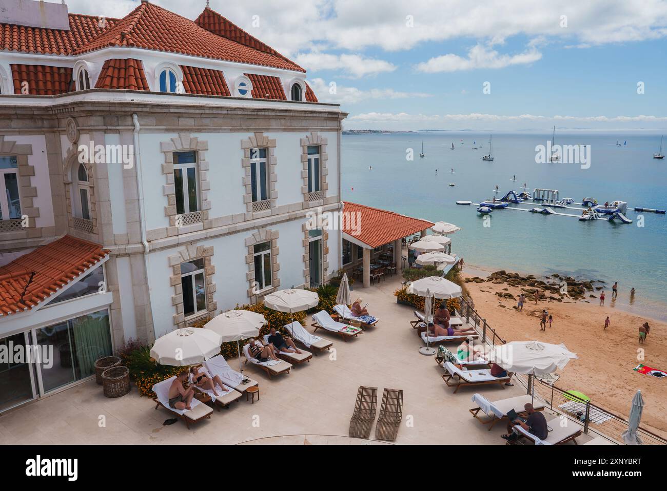 Luxurious Seaside Hotel with Classic Architecture and Beachfront ...