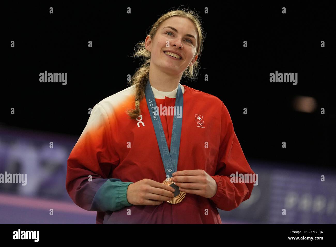 Zoe Claessens of Switzerland poses with her bronze medal of the BMX ...